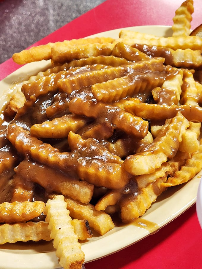 Gravy-smothered fries that make you question why you ever bothered with ketchup. This is what potatoes dream of becoming.
