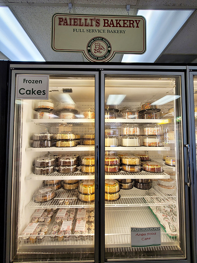The frozen cake section: where celebrations-in-waiting patiently stand by. Each one a party waiting to happen.