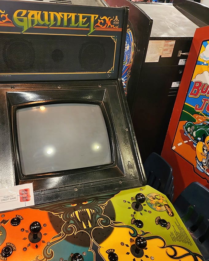 Gauntlet's faded control panel has absorbed thousands of hours of button-mashing intensity. "Warrior needs food badly" indeed—and I need just one more game.