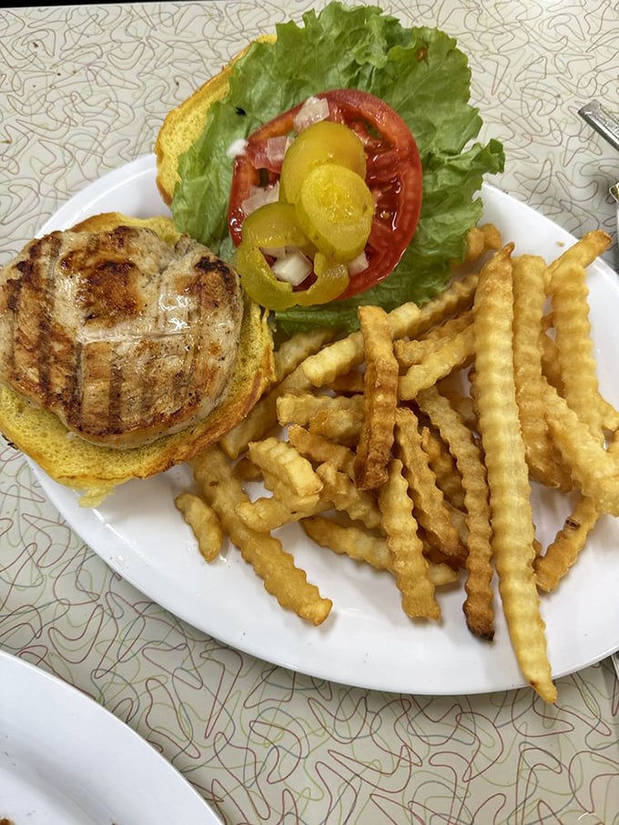 A classic grilled chicken sandwich with crinkle-cut fries—proof that lunch doesn't need to be complicated to be magnificent.