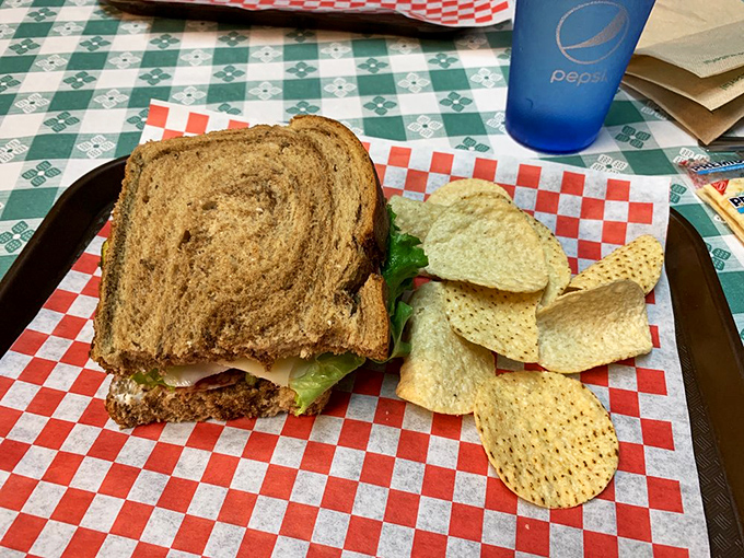 Sometimes half a sandwich is all you need – especially when it's this good. The checkered paper is like a finish line flag for your taste buds.
