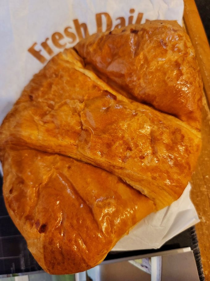 This ham and cheese croissant isn't just breakfast—it's edible architecture, with buttery layers creating the perfect savory morning masterpiece.