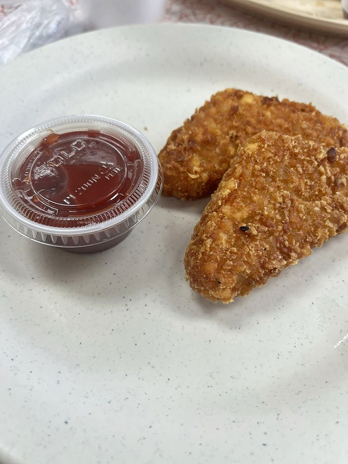 These aren't just hash browns—they're crispy potato perfection that would make your grandmother both jealous and proud simultaneously.
