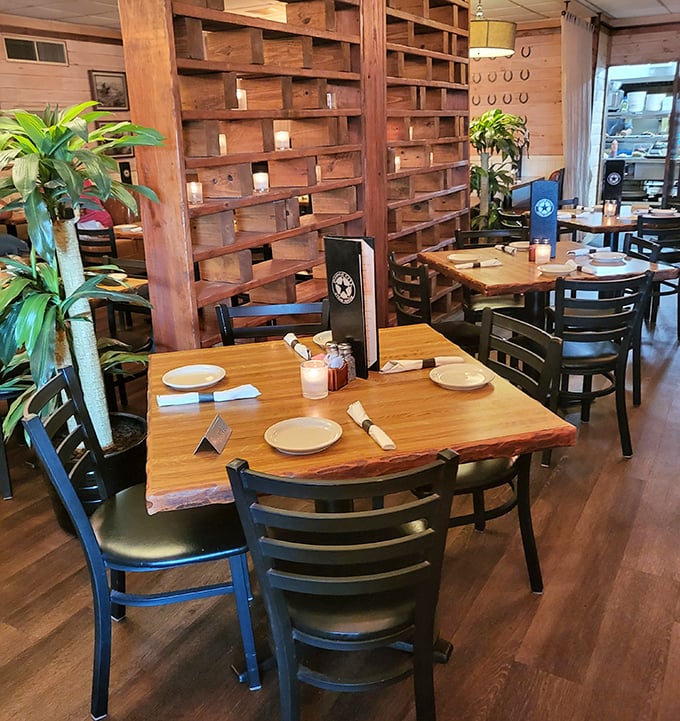 Live plants and thoughtful wooden dividers create dining spaces that feel like your own private corner of the Wild West. Intimate without being cramped.