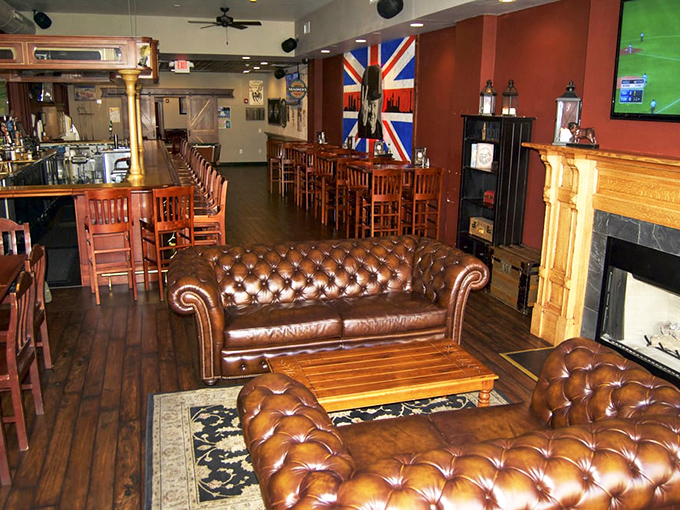 Chesterfield sofas, Union Jack pride, and a fireplace ready for post-match debates – this isn't decoration, it's transportation to a corner of England.