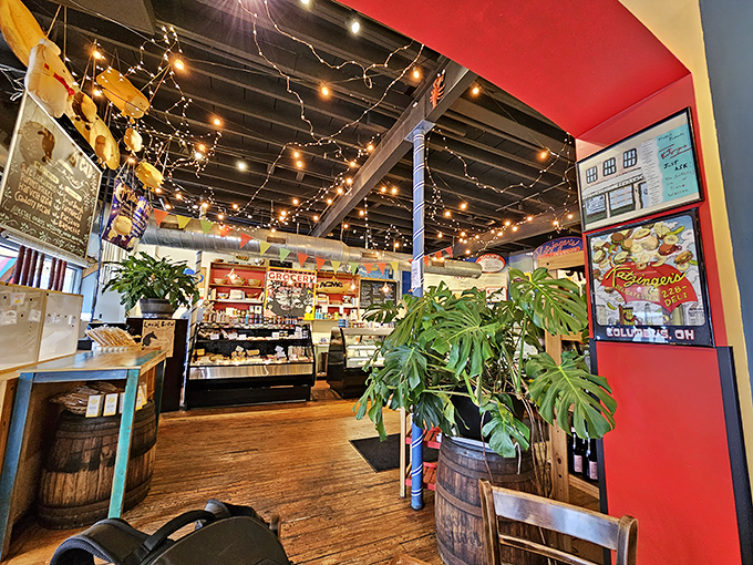String lights twinkle above shelves of gourmet goods, creating the warm ambiance of a deli that knows comfort food is serious business.