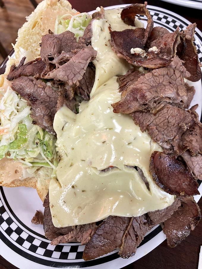 The Jewish cheesesteak doesn't try to be Philadelphia's version—it's proudly Maryland's interpretation, where beef and cheese find perfect harmony.