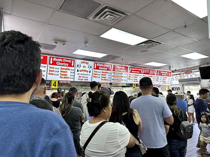 The line speaks volumes—nobody waits this long unless something magical awaits at the counter. Worth every minute.