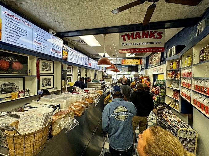 The line at Attman's isn't just a queue—it's a rite of passage where anticipation builds with each shuffle forward toward sandwich salvation.