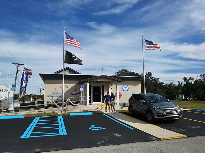 The Military Sea Services Museum stands proudly under twin flags, preserving stories that deserve telling more than my vacation slideshow ever did. 
