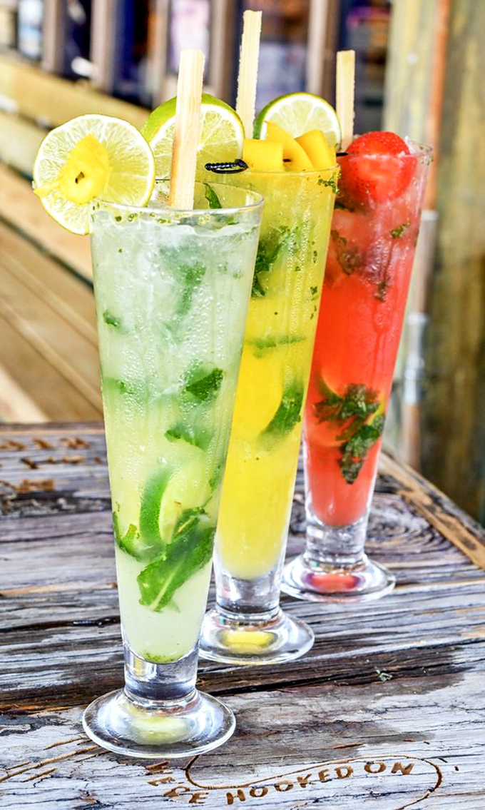 The colorful mojito trio looks like Florida distilled into glassware—refreshing, vibrant, and guaranteed to improve your outlook on life.