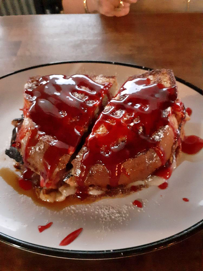 The Monte Cristo sandwich—where breakfast and lunch hold hands in a sweet and savory romance that makes you question all other sandwiches.