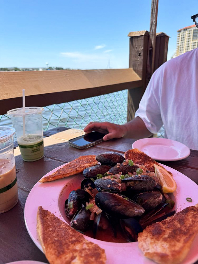These mussels aren't just served—they're presented, swimming in a broth so good you'll be requesting extra bread for necessary sopping duties.