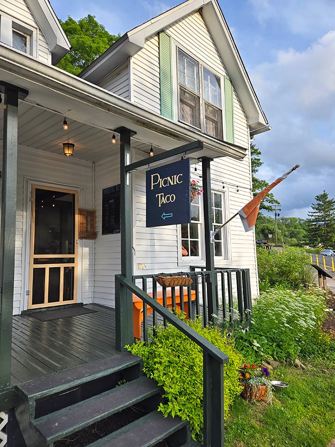 Picnic Taco's charming porch and hand-painted sign invite you to experience how West Virginia interprets global street food with Appalachian ingredients.