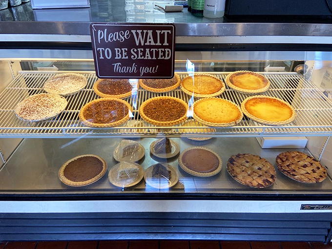 The pie case at Reececliff isn't just a display—it's a shrine to the religion of homemade desserts that makes willpower crumble faster than their crusts.