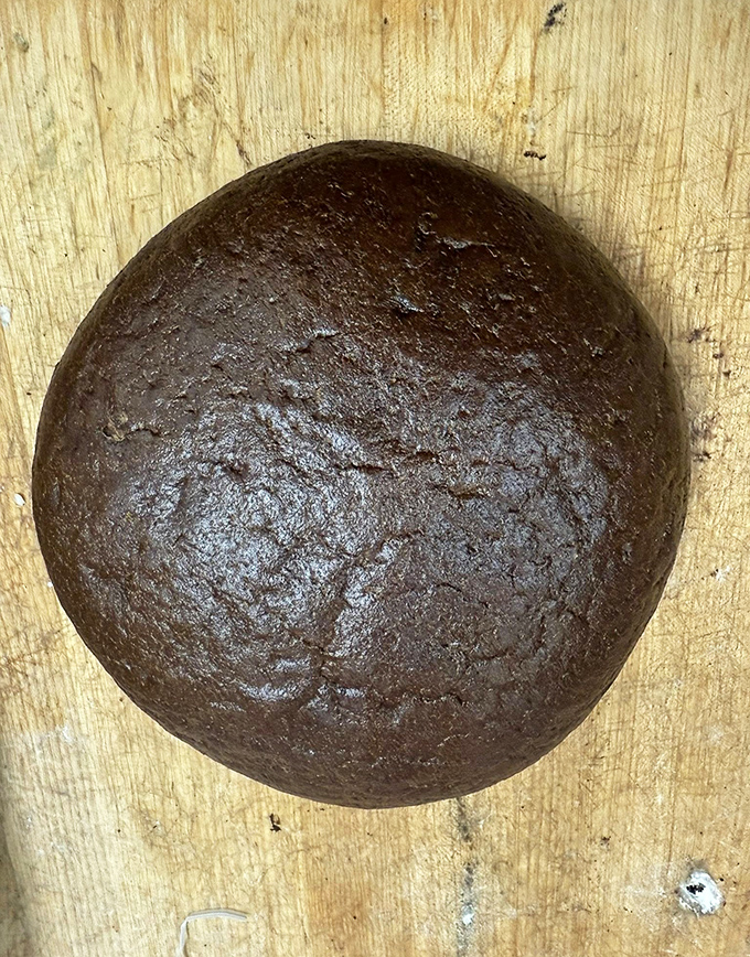 Dark, mysterious, and deeply satisfying—this pumpernickel loaf is the bread equivalent of a thoughtful conversation. Perfect for serious sandwich architects.