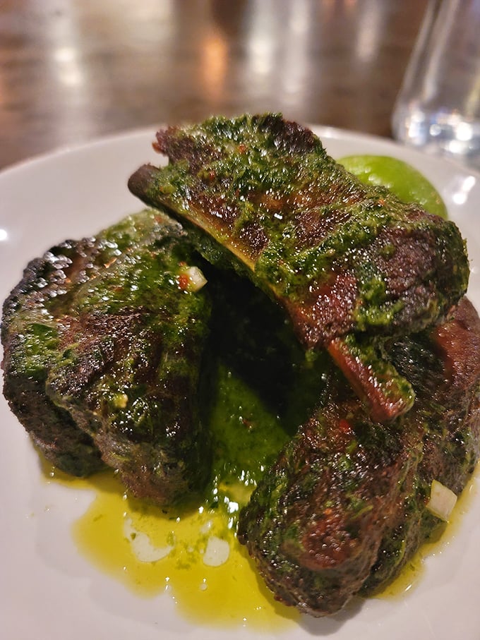 These herb-crusted ribs aren't just falling off the bone—they're practically filing for independence from the meat kingdom.