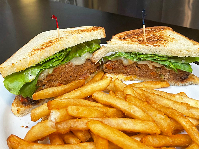 This meatloaf sandwich isn't just comfort food – it's a warm hug on a plate, nestled between toasted bread with fries that achieve the Platonic ideal of crispness.