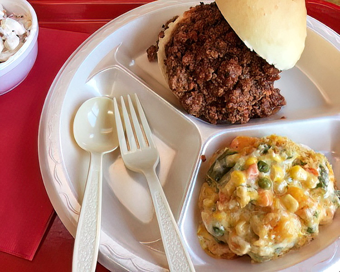 The Sloppy Joe that launched a thousand napkins, paired with vegetable medley that somehow makes you forget you're eating something healthy.