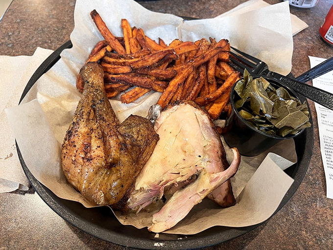 Smoked chicken that defies poultry physics. Somehow both tender and firm, juicy and smoky—it's the quantum mechanics of barbecue science.