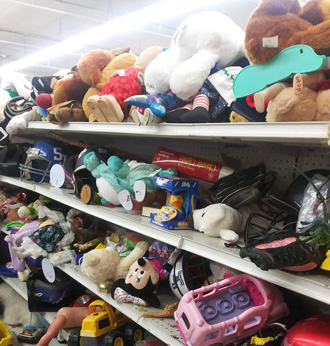 Stuffed animals piled high, silently hoping for second homes. That slightly lopsided teddy bear might be someone's next best friend.