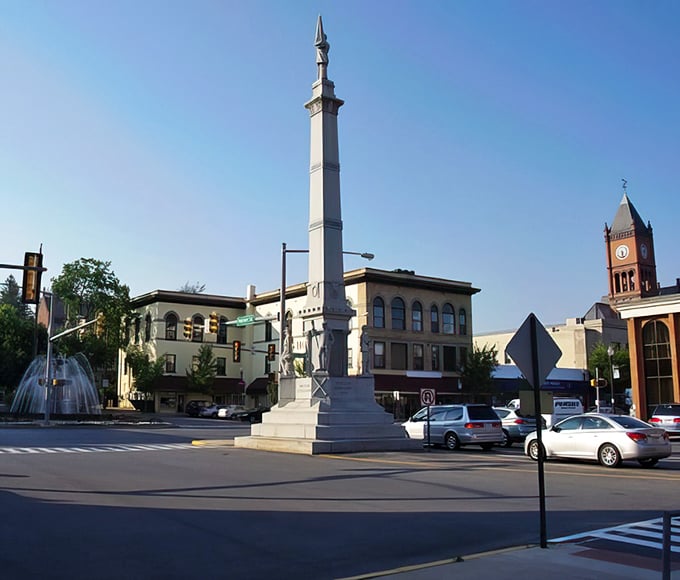Downtown's monument square—where history stands tall and locals gather to debate everything from politics to the best pie in town.