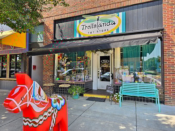 Trollslända Toy Store brings whimsy to Main Street with its colorful dala horse standing guard. Childhood joy knows no age limit here.
