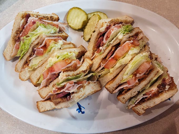 The club sandwich—three stories of deliciousness where every floor is better than the last. Skyscraper eating at its finest.