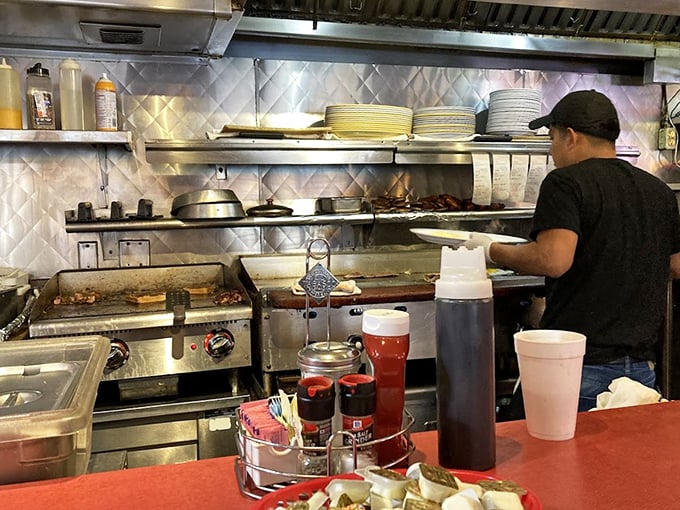 Where breakfast dreams come true – the kitchen counter at City Diner serves up plates of morning happiness.