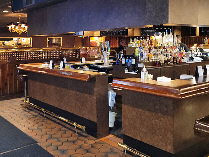 The bar counter—where strangers become friends and friends become family. Wood polished by thousands of elbows and countless stories.
