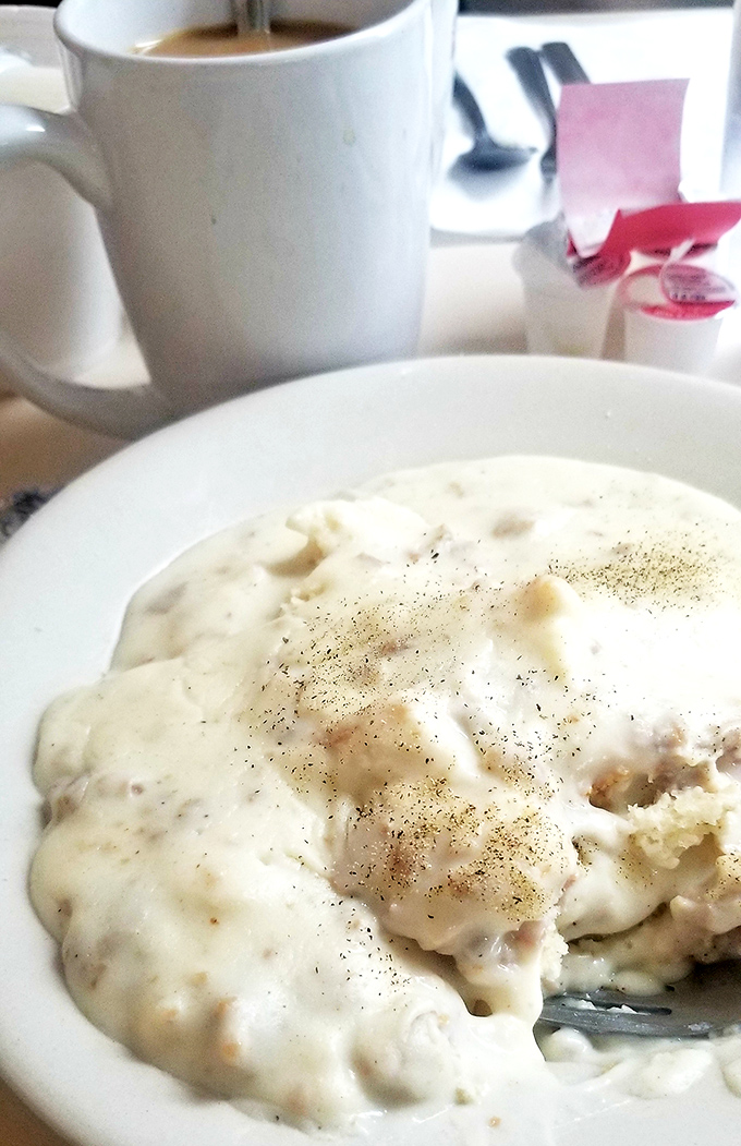Biscuits and gravy: the breakfast that hugs you from the inside. This plate doesn't just feed your body—it nourishes your soul with creamy, peppery goodness.