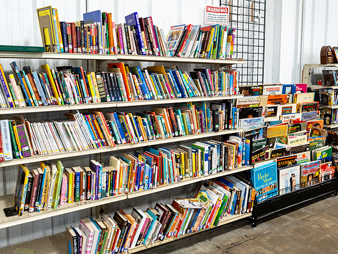The literary corner offers dog-eared paperbacks and forgotten bestsellers. Every shelf a reminder that one person's discarded beach read is another's treasure.