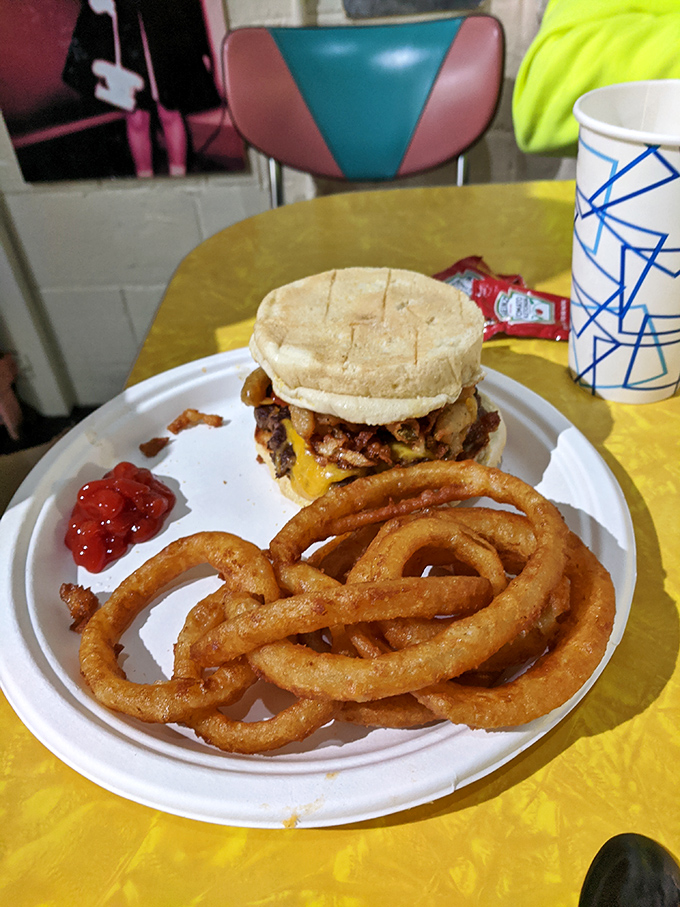 This breakfast sandwich with onion rings isn't just breaking rules—it's creating better ones. Breakfast and lunch just called a truce.