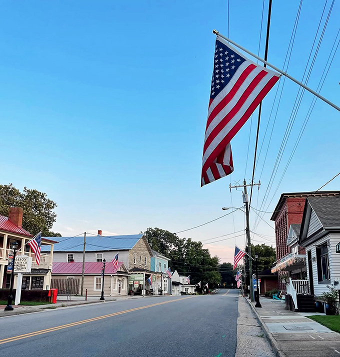 Stars and stripes flutter above Urbanna's historic streets, where American flags aren't just decorations but proud statements from a town that's seen centuries of history.