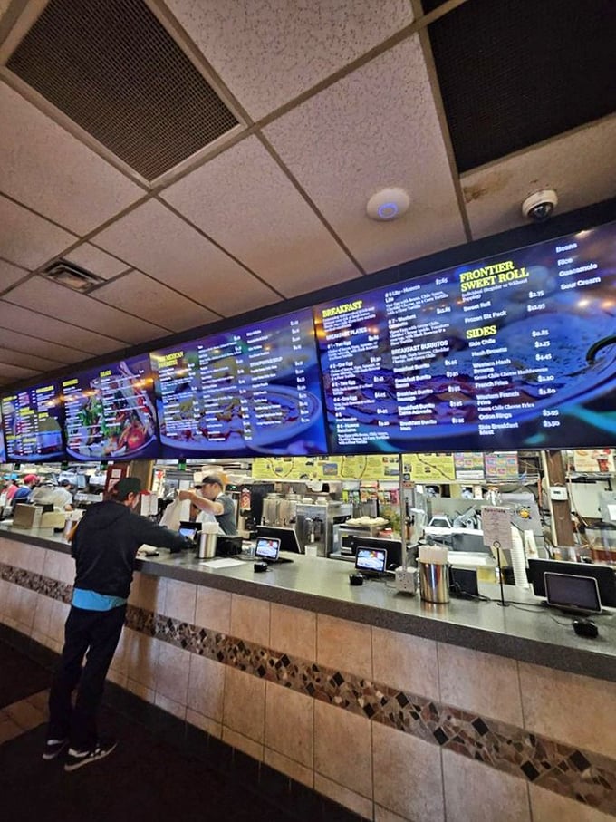 The ordering counter—where dreams are placed, numbers are given, and the anticipation of green chile goodness officially begins.