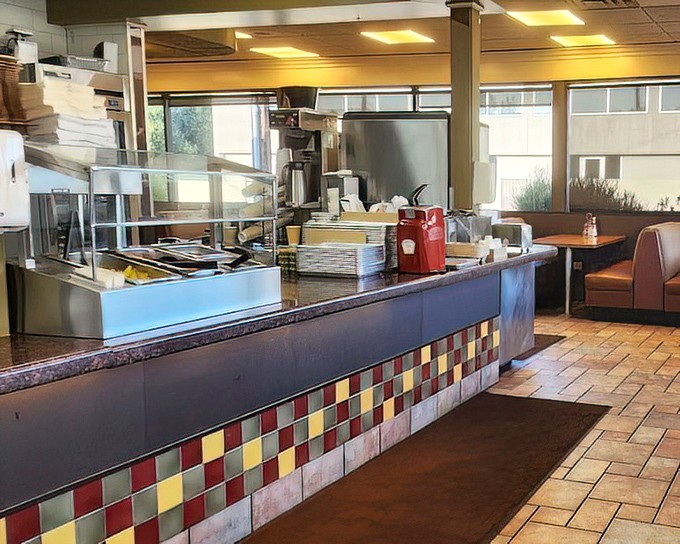 Where the magic happens! The counter area showcases the colorful tile work and open kitchen—dinner and a show in the most satisfying way.