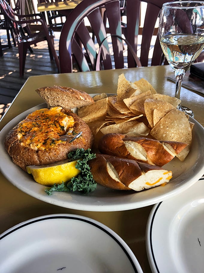 This bread bowl of crab dip isn't just an appetizer – it's the beginning of a beautiful friendship between carbs and seafood. 
