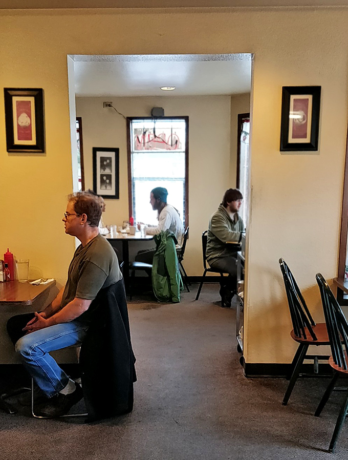 The dining room hums with the energy of locals getting their breakfast fix—a community gathered around the universal language of good food.