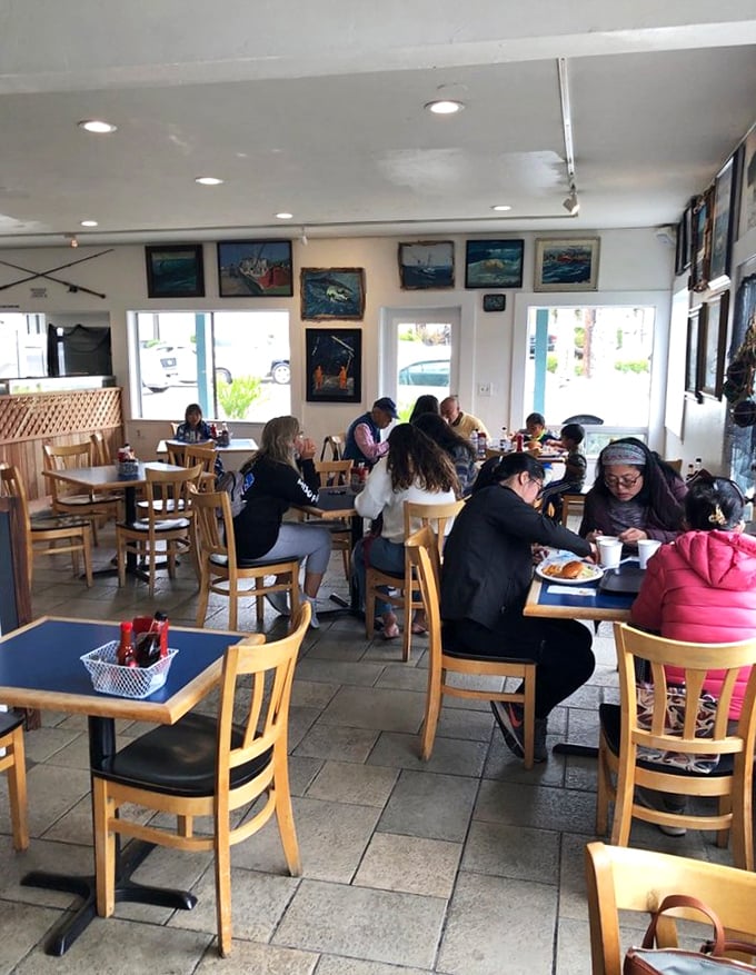 A dining room filled with people who look like they know something you don't—until you taste the food and join their secret society.