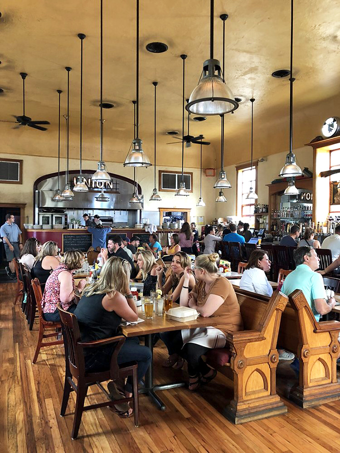 The universal language of good food being spoken at every table. Notice nobody's looking at their phones—that's the true magic of exceptional barbecue.