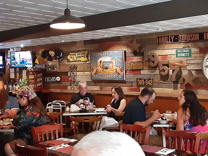 Diners lost in conversation and contemplation of their next bite—the universal language of good food bringing strangers together.