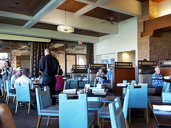 The dining room hums with the best kind of energy—conversations, clinking glasses, and the occasional gasp of delight when food arrives.