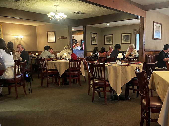 Diners lost in conversation and contemplation of their meals—the universal language of good food bringing people together.