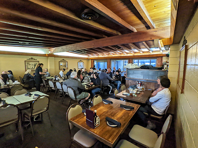 Peak dinner hour energy as locals and travelers unite in their appreciation for authentic California steakhouse tradition.