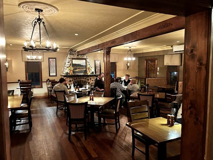 Where strangers become friends over shared appreciation of good food. The warm lighting flatters both the diners and what's on their plates.