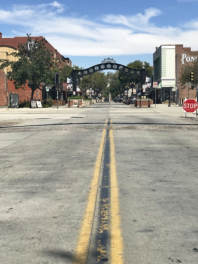 Pomona's downtown streets offer a perfect symmetry of history and possibility, with the iconic Antique Row arch framing adventures waiting to unfold.