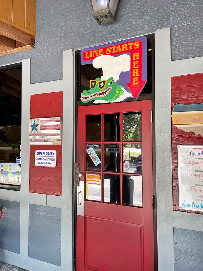That cheerful gator mascot knows what's up - this is where the line starts for seafood happiness.
