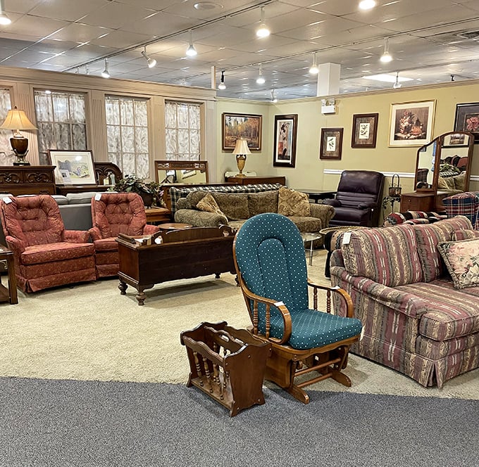 A second living room display that screams "comfy Sunday afternoon naps." That blue glider rocker has probably heard thousands of bedtime stories.