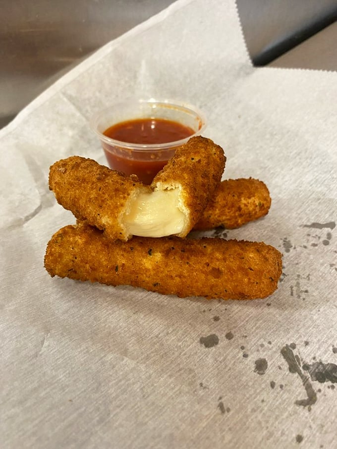 Mozzarella sticks: the diplomatic negotiators between marinara sauce and your taste buds. Stretchy, golden, perfect.