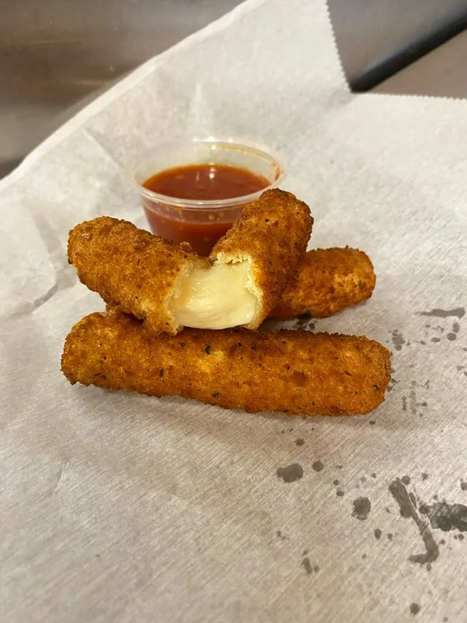 Mozzarella sticks: the diplomatic negotiators between marinara sauce and your taste buds. Stretchy, golden, perfect.